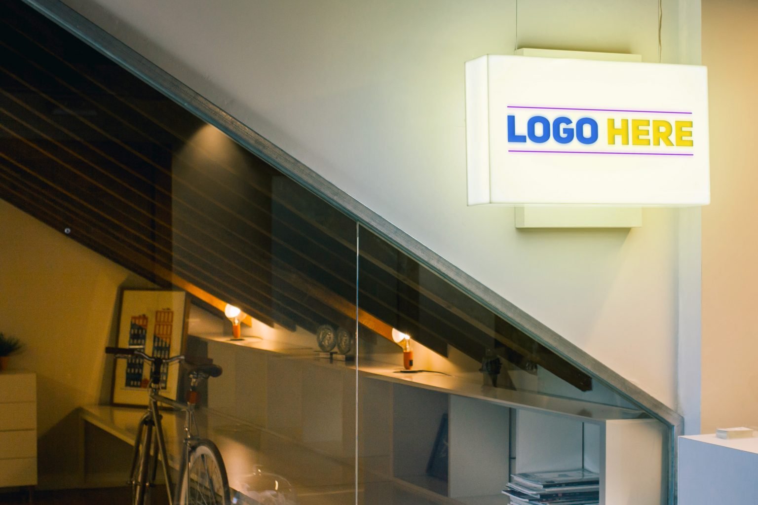 Free Hanging Wall Sign Logo Mockup – GraphicsFamily