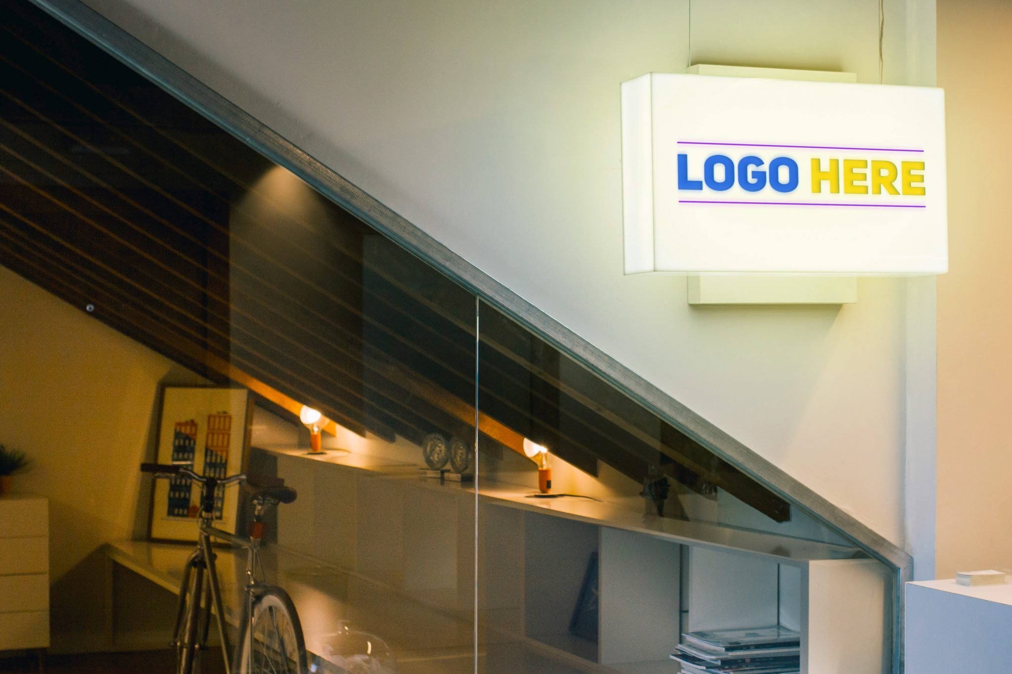 Free Hanging Wall Sign Logo Mockup – GraphicsFamily