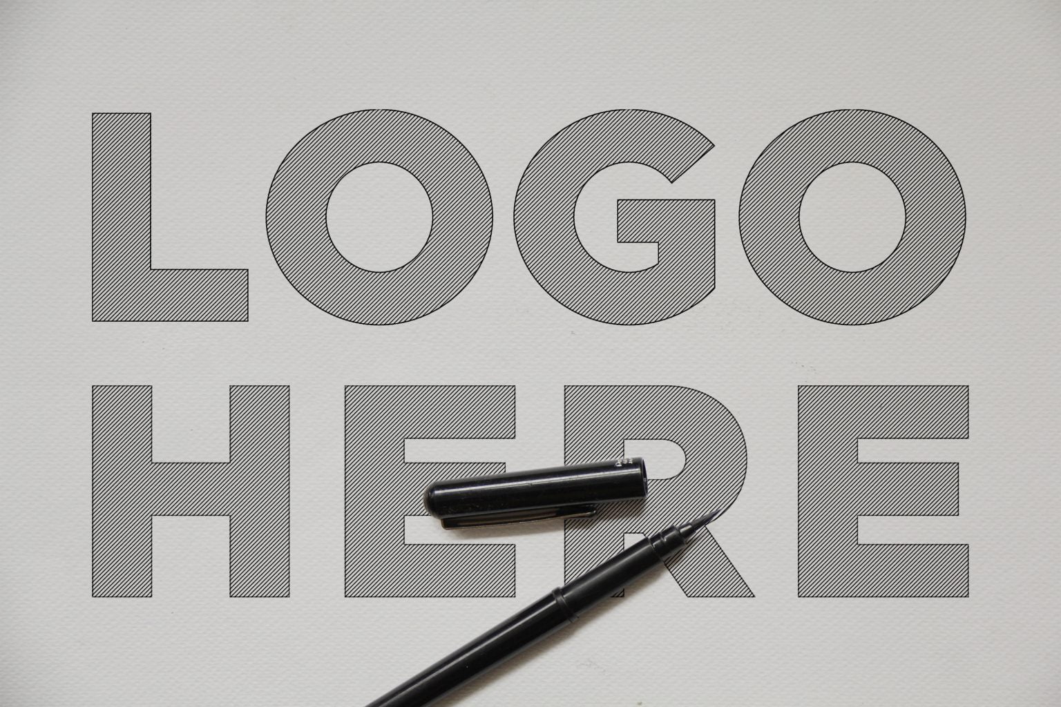 Outline Sketch Logo Mockup – GraphicsFamily