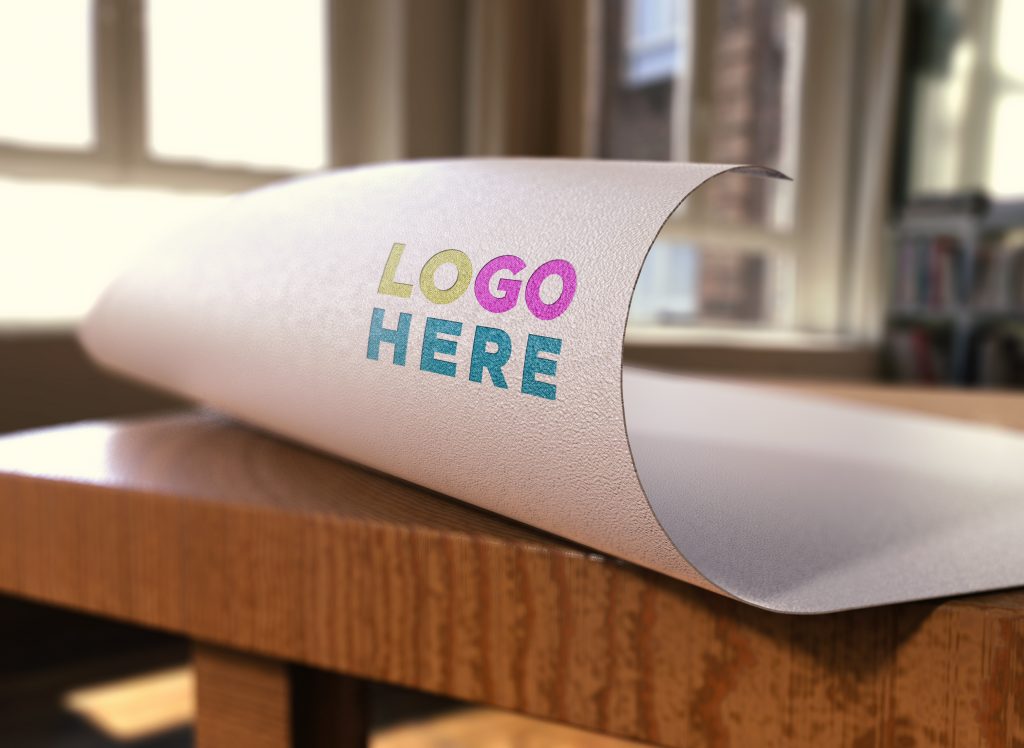 Free Paper Pressed Logo Mockup – GraphicsFamily