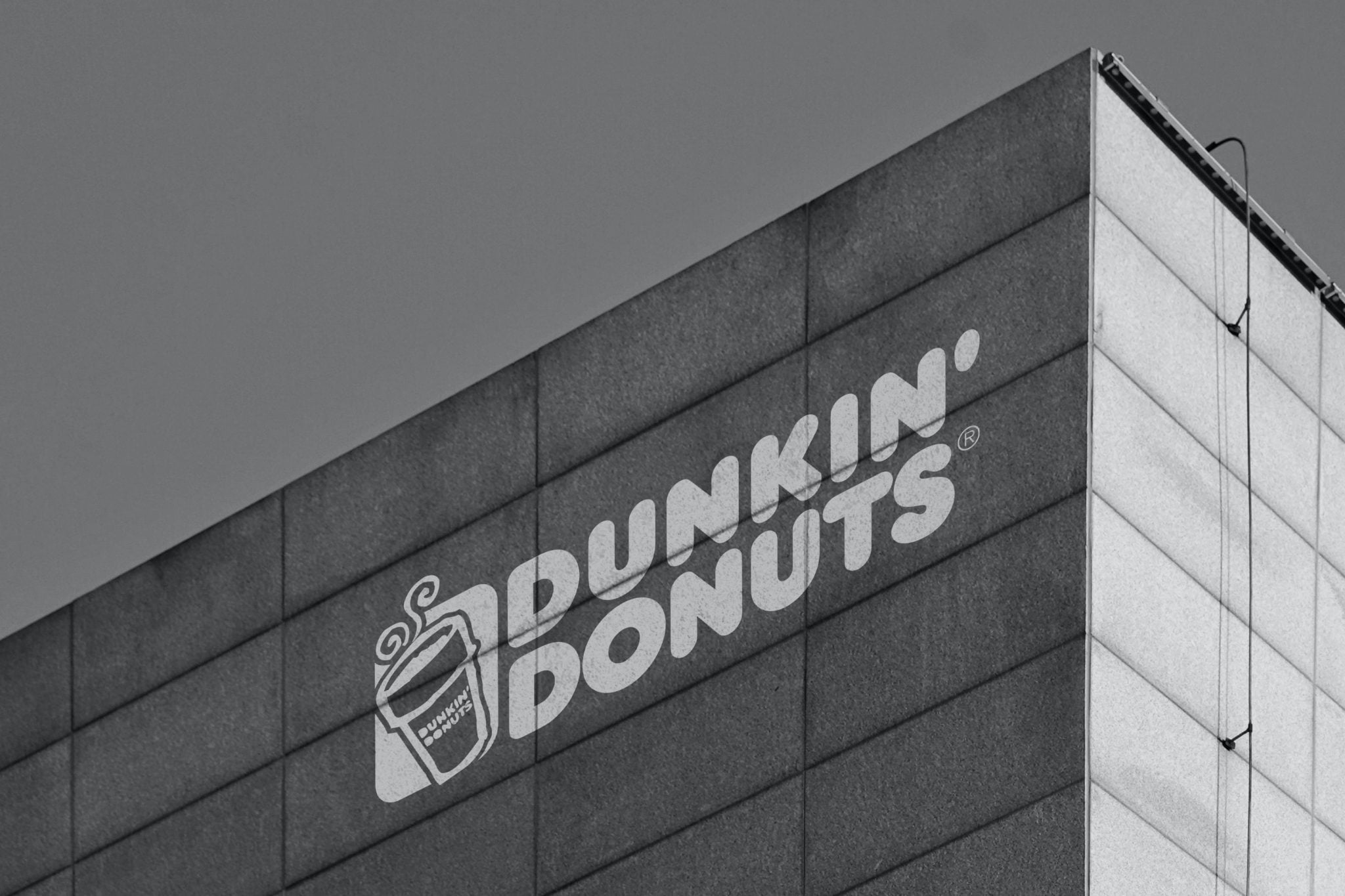 Black and White Building Logo Mockup – GraphicsFamily