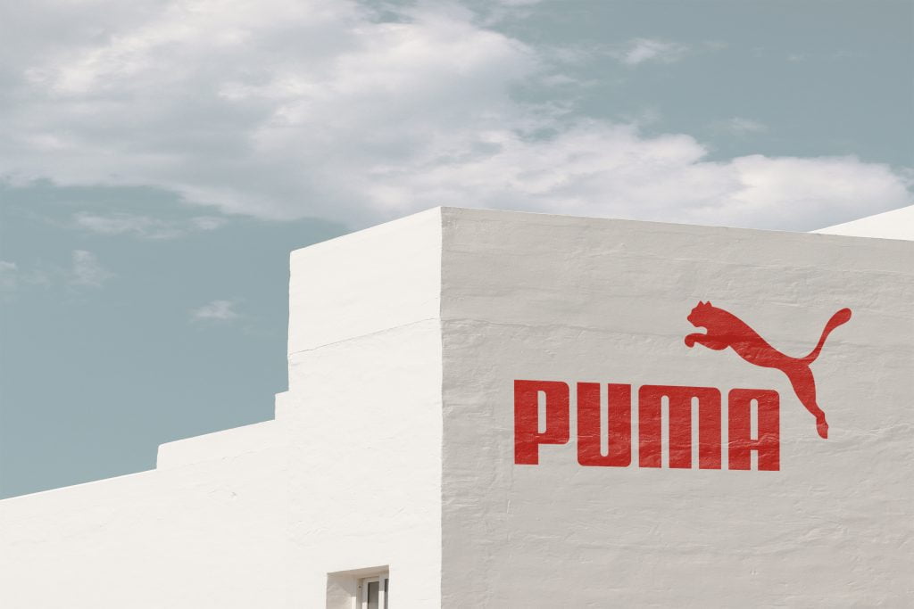 White painted wall realistic logo mockup – GraphicsFamily