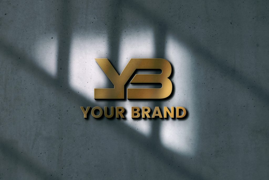 Golden 3D Logo Mockup on Black Wall – GraphicsFamily