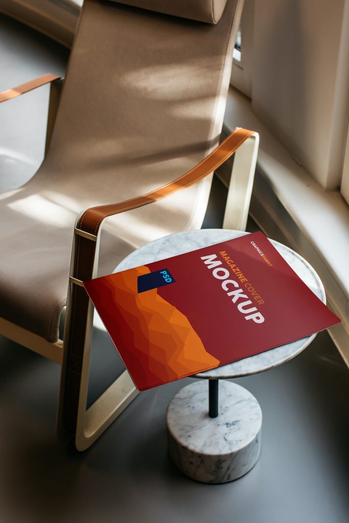 Magazine On Table Mockup – GraphicsFamily
